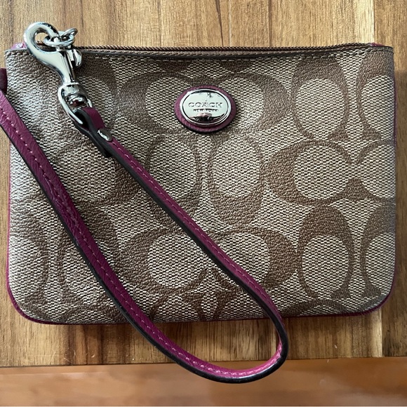 Coach | Bags | Coach Logo Print Wristlet With Berry Colored Strap ...